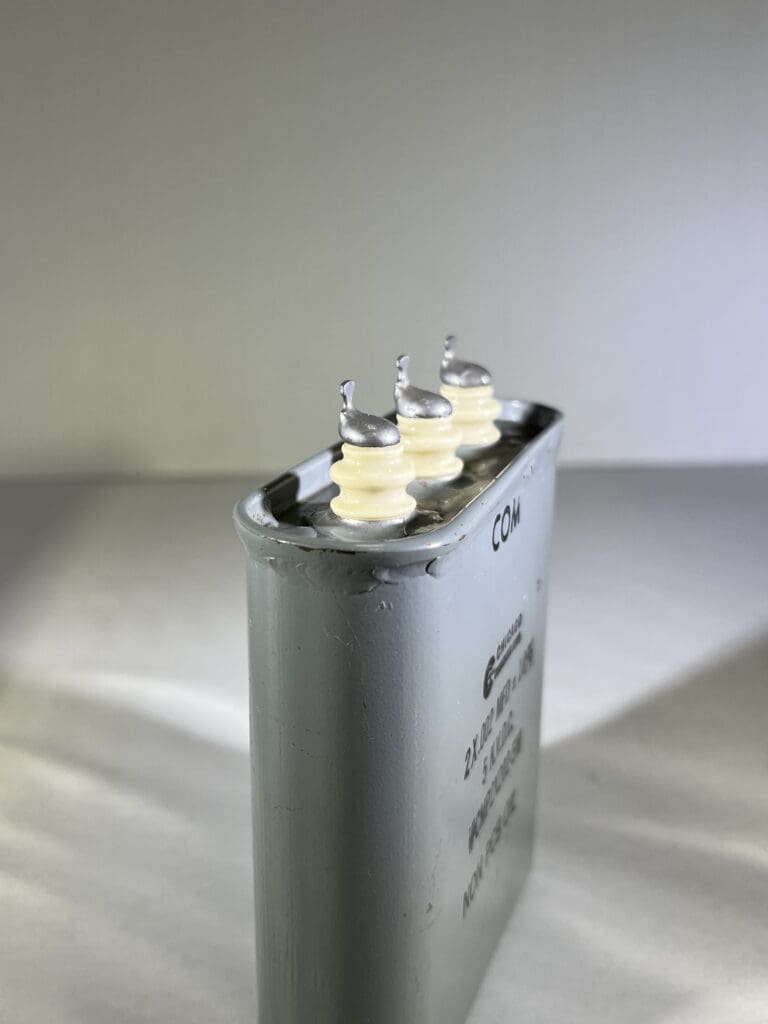 CMP2X202-5M 2×.002 uF 5000 VDC Capacitor - Capacitor Industries
